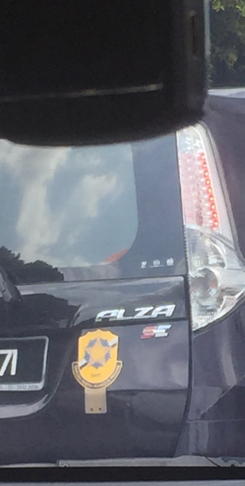 Saw Alza with Dato emblem