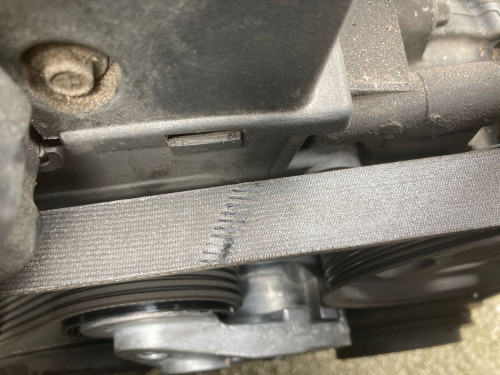 Fan Belt with frayed stitches