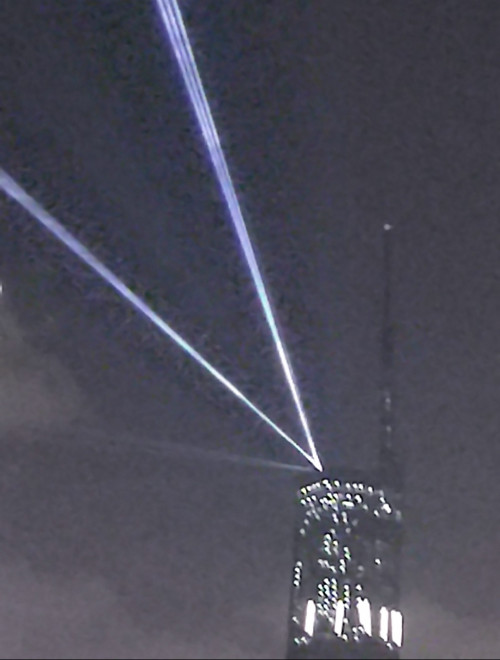Gila babi bright laser light shining 118 tower