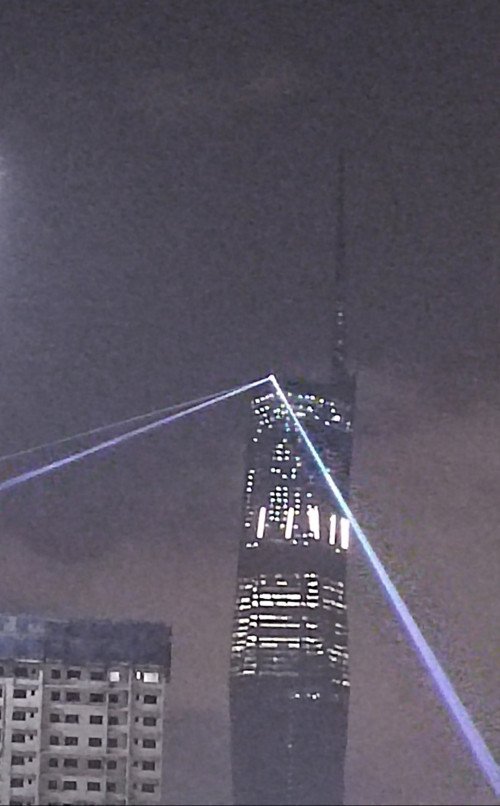 Gila babi bright laser light shining 118 tower