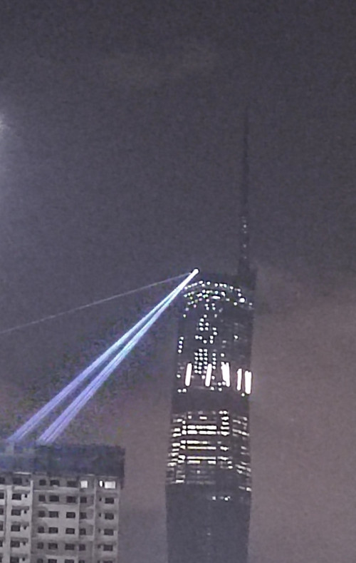 Gila babi bright laser light shining 118 tower